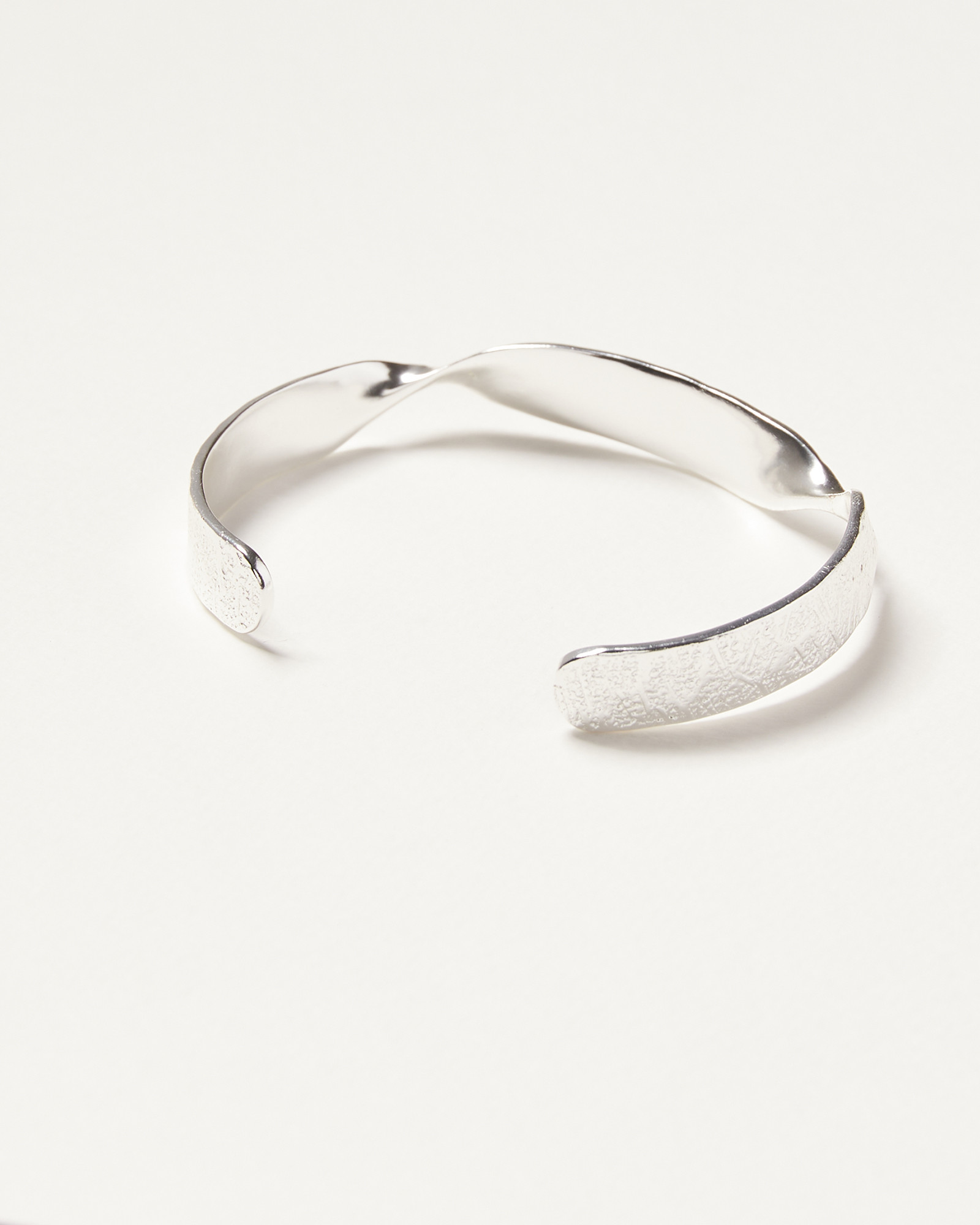 Tempo Textured Twist Silver Plated Bangle | Oliver Bonas