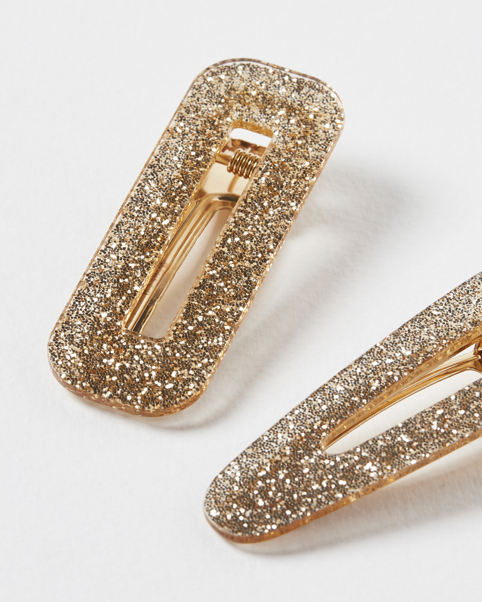Noella Gold Glitter Resin Hair Clips Pack of Two | Oliver Bonas