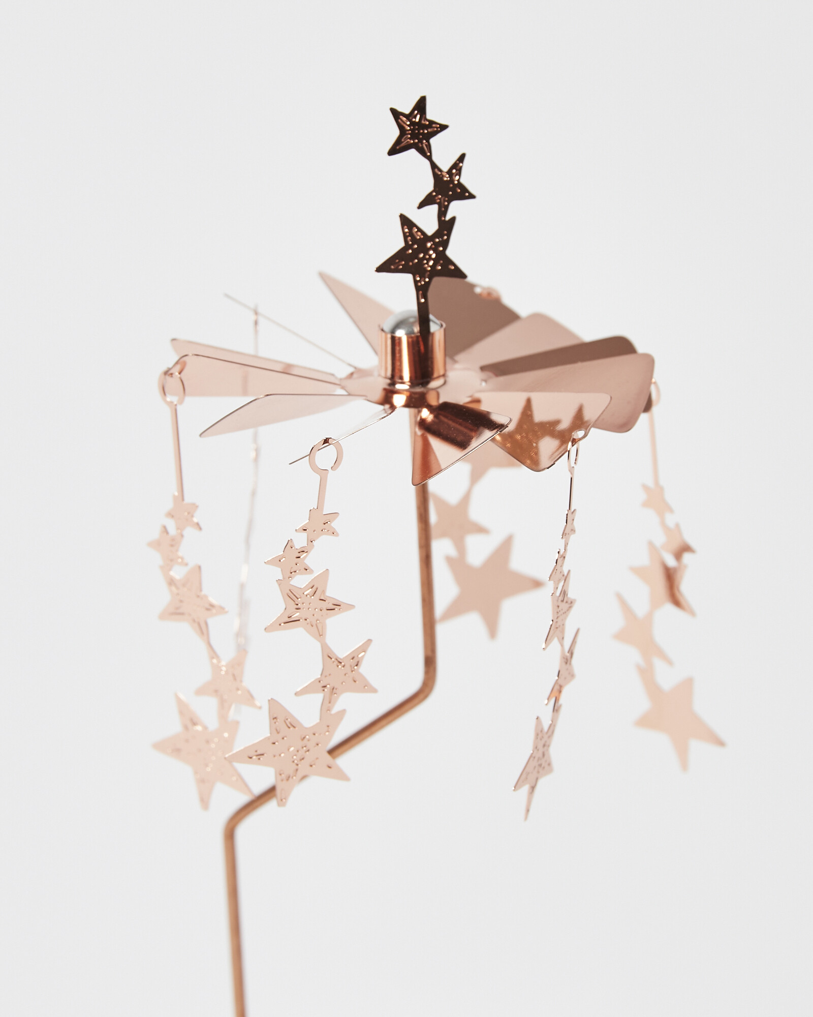 Mini Stars Rose Gold Metal Candle Spinner | Oliver Bonas