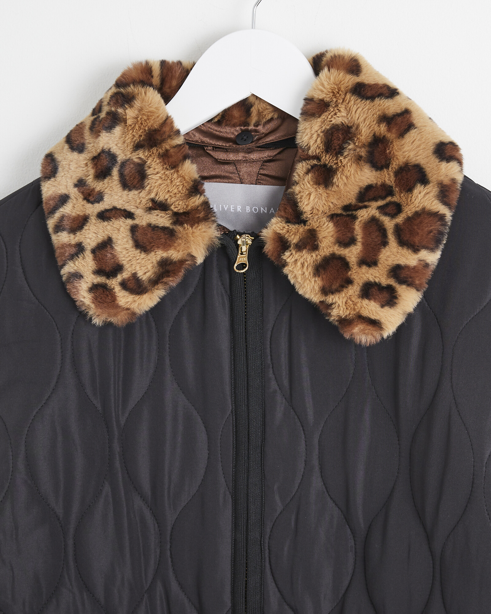 Animal Print Faux Fur Collar Black Quilted Jacket | Oliver Bonas