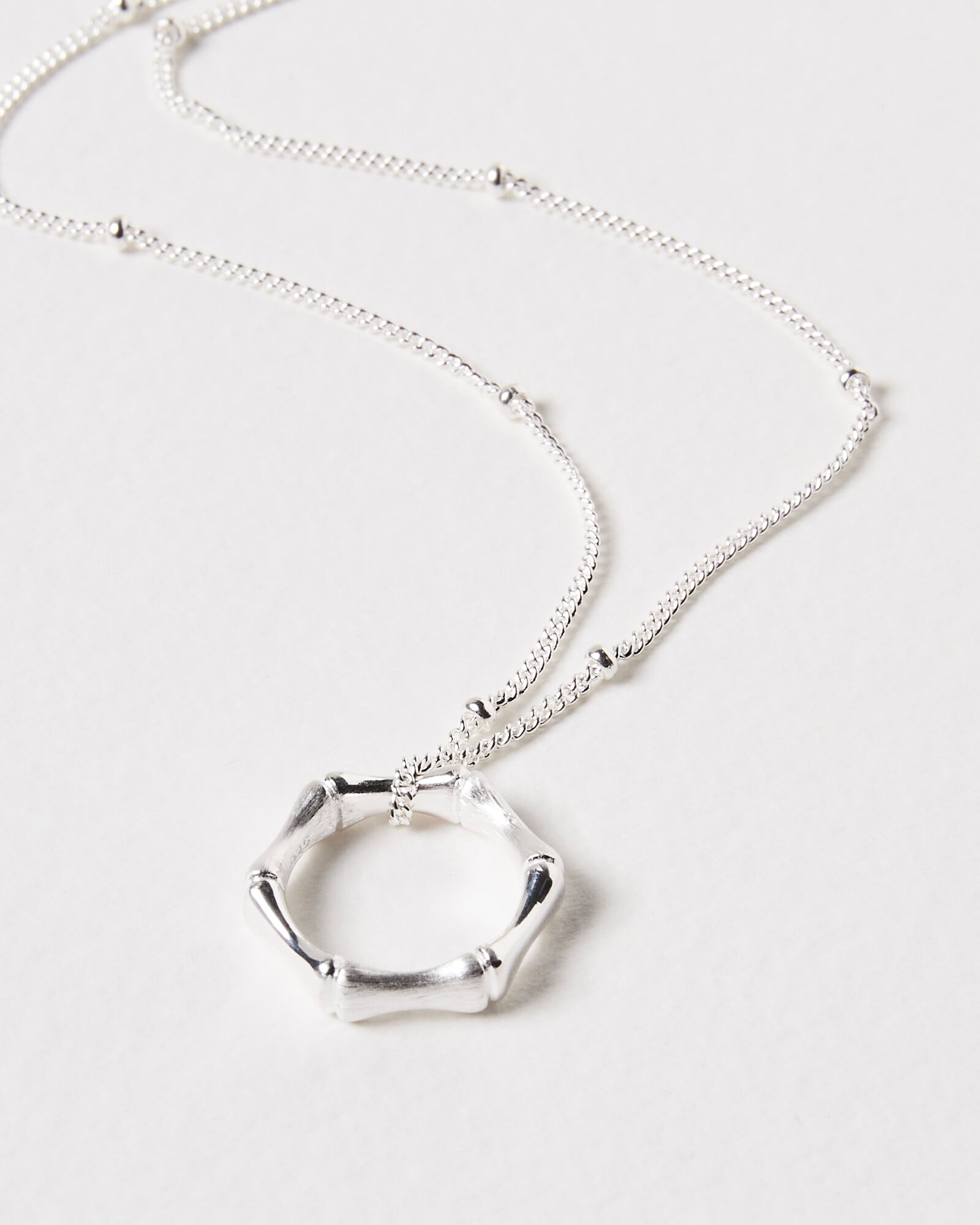 Gemini Disco Bamboo Silver Pendant Necklace | Oliver Bonas