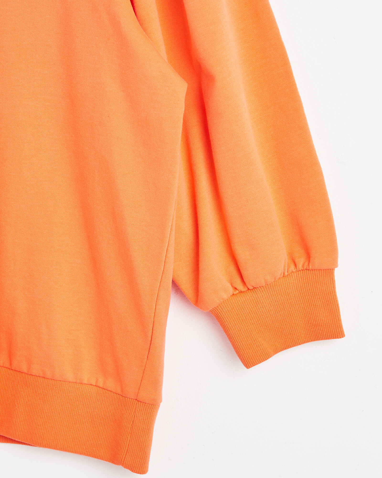 Puff Sleeve Orange Jersey Top | Oliver Bonas