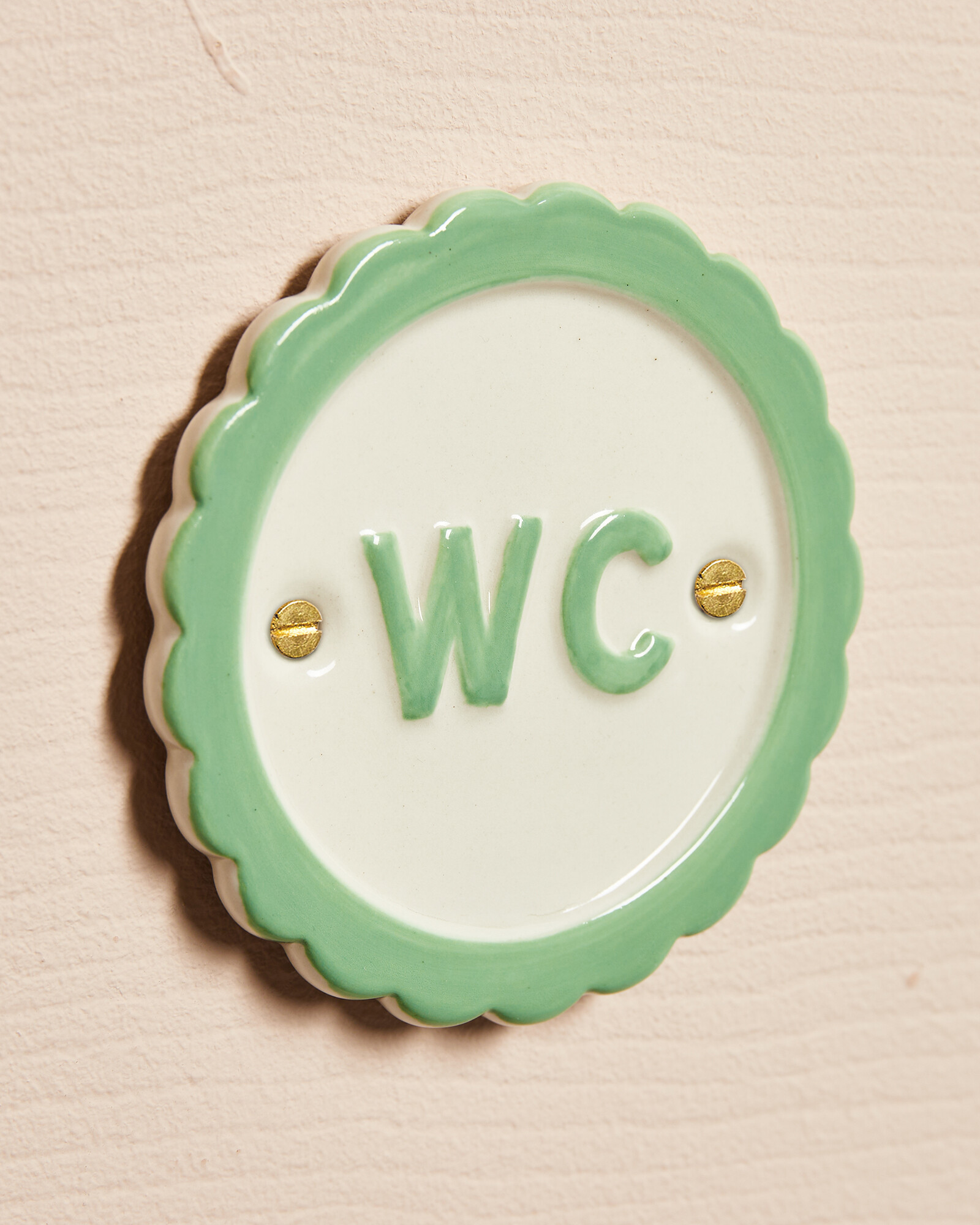 Round Green Ceramic WC Bathroom Sign | Oliver Bonas