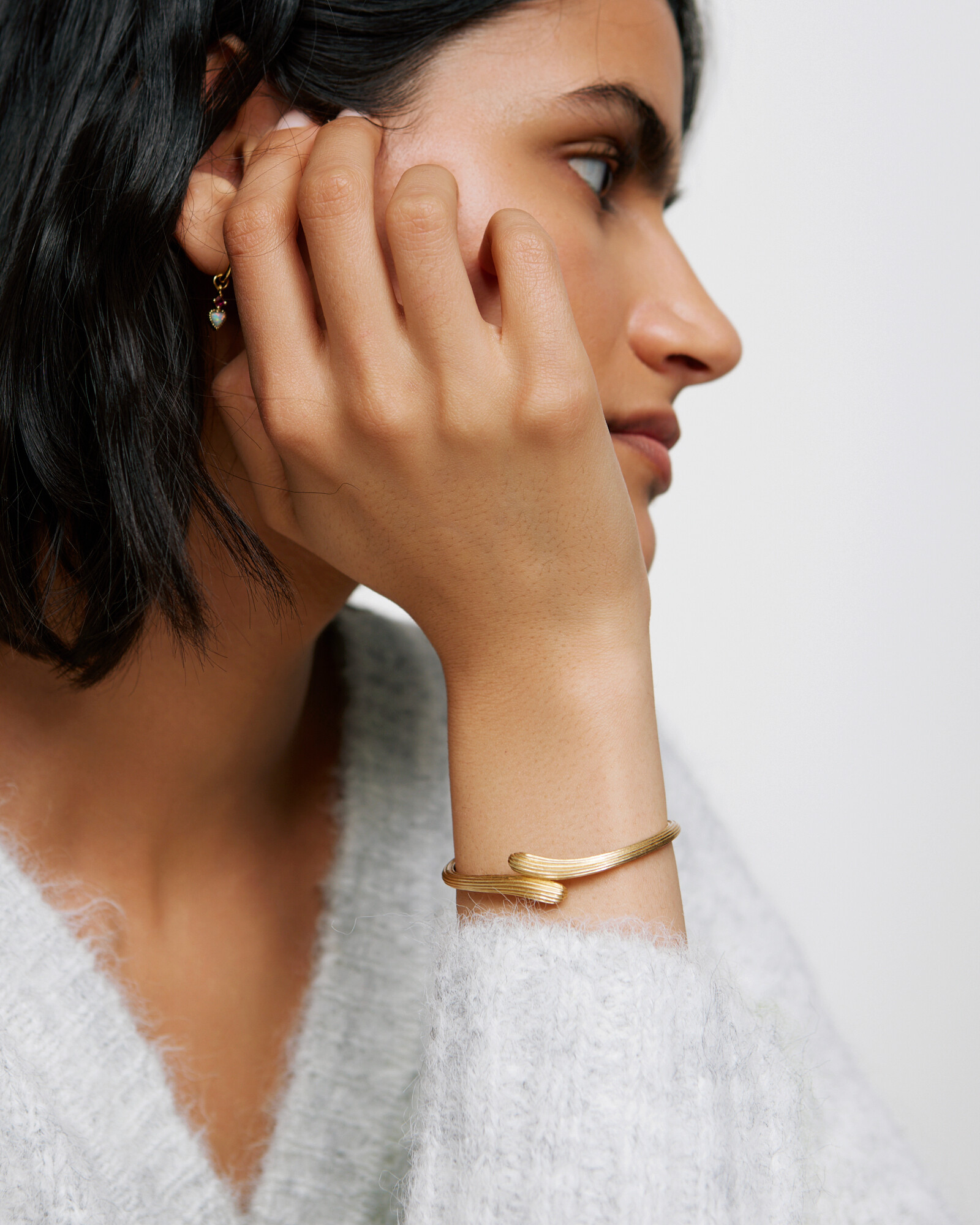 Maribel Sculptural Gold Plated Bangle | Oliver Bonas