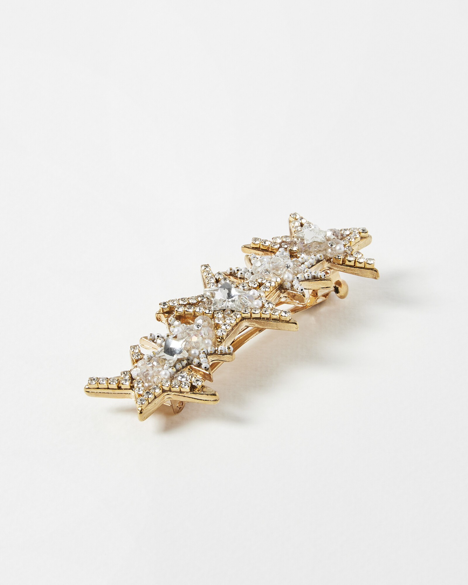 Celeste Gold Starburst Hair Clip | Oliver Bonas