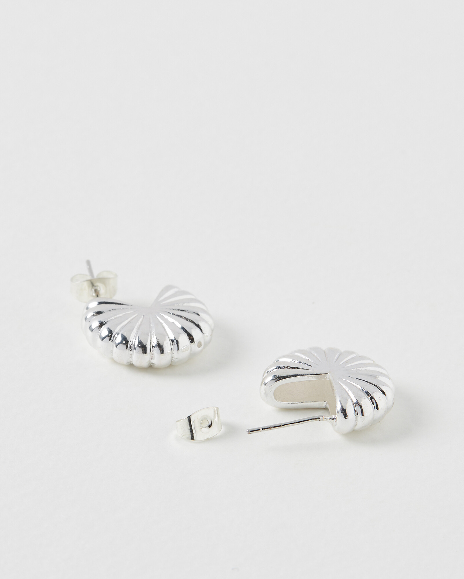Mia Curved Silver Tone Chunky Hoop Earrings | Oliver Bonas