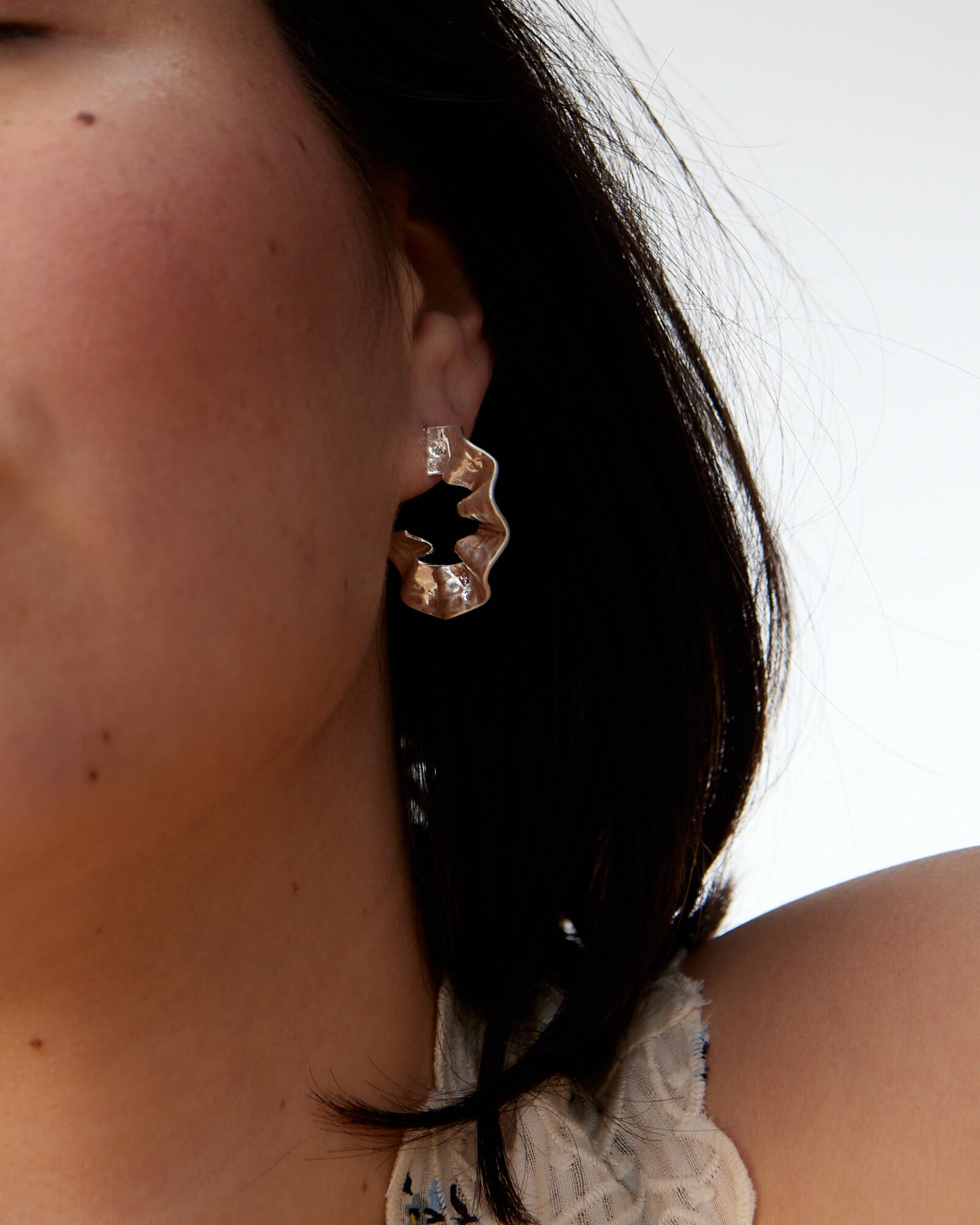 Orin Wavy Hammered Silver Tone Hoop Earrings | Oliver Bonas