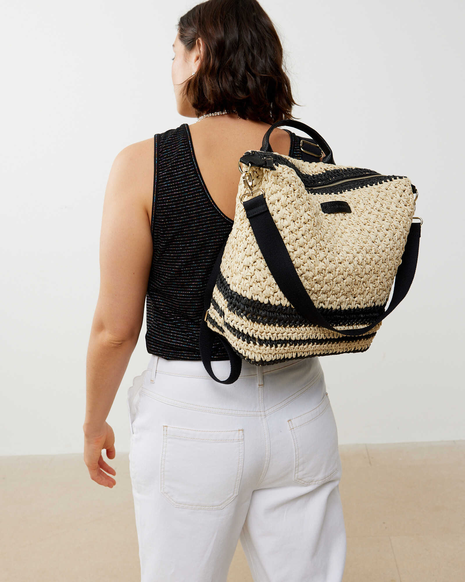 Ethel Brown Raffia Woven Backpack | Oliver Bonas