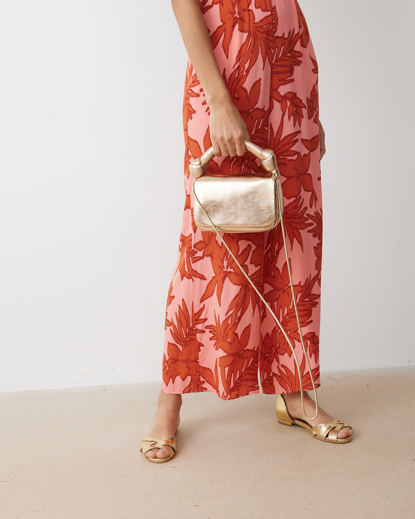 Viv Rose Gold Metallic Clutch Bag | Oliver Bonas