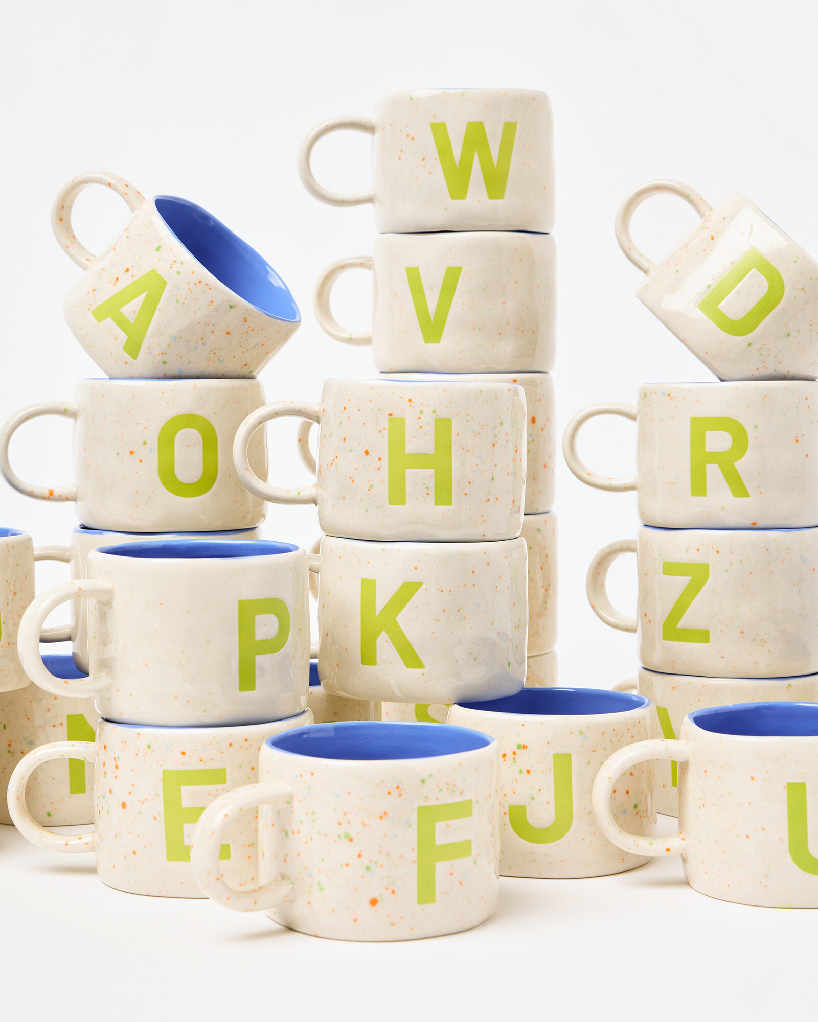 Fresca Alphabet White Speckle Ceramic Initial Mug | Oliver Bonas