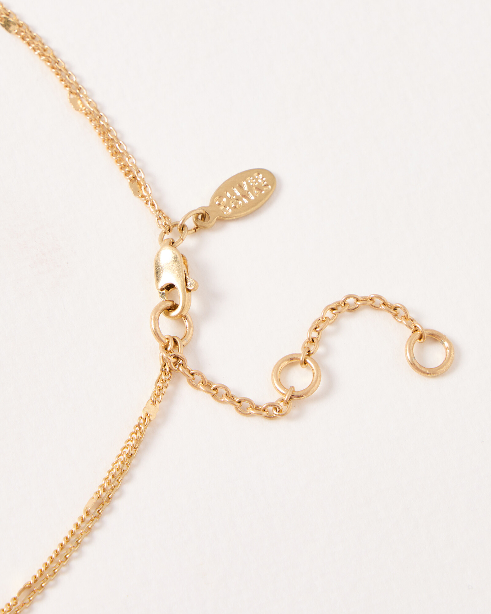Claire Molten Charm Gold Tone Layered Pendant Necklace | Oliver Bonas