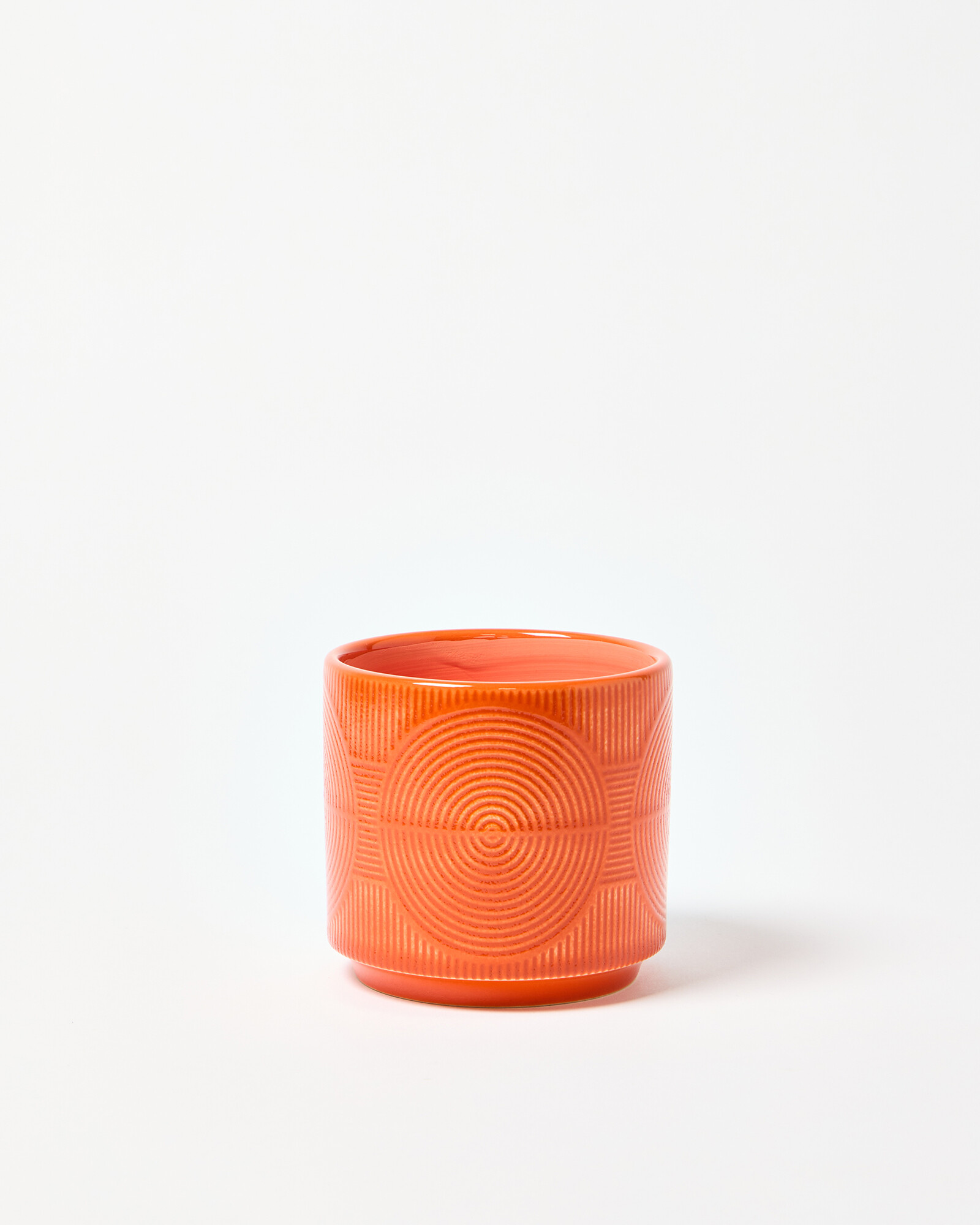 Cerchio Embossed Orange Ceramic Plant Pot Small | Oliver Bonas