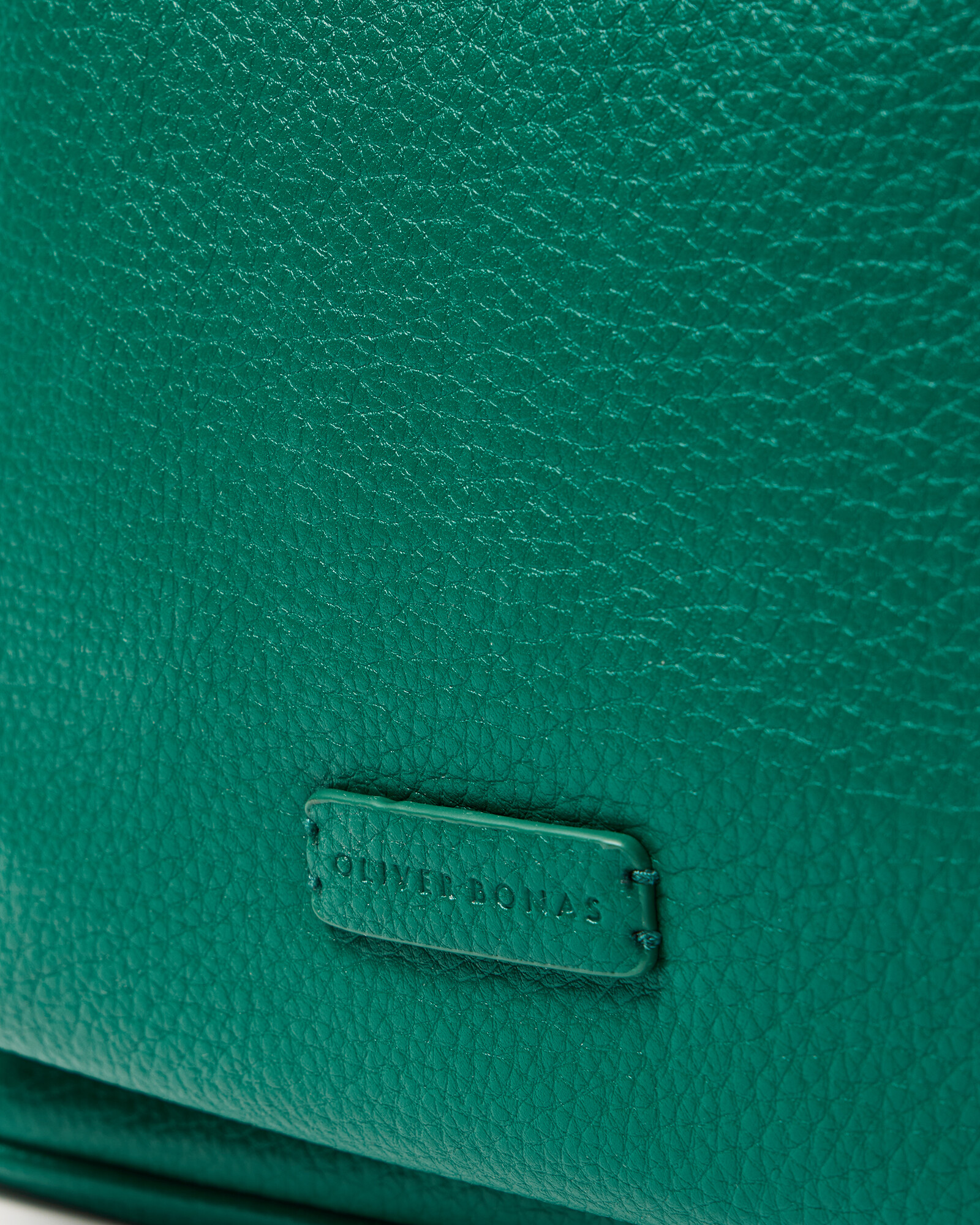 Austin Curved Green Backpack | Oliver Bonas