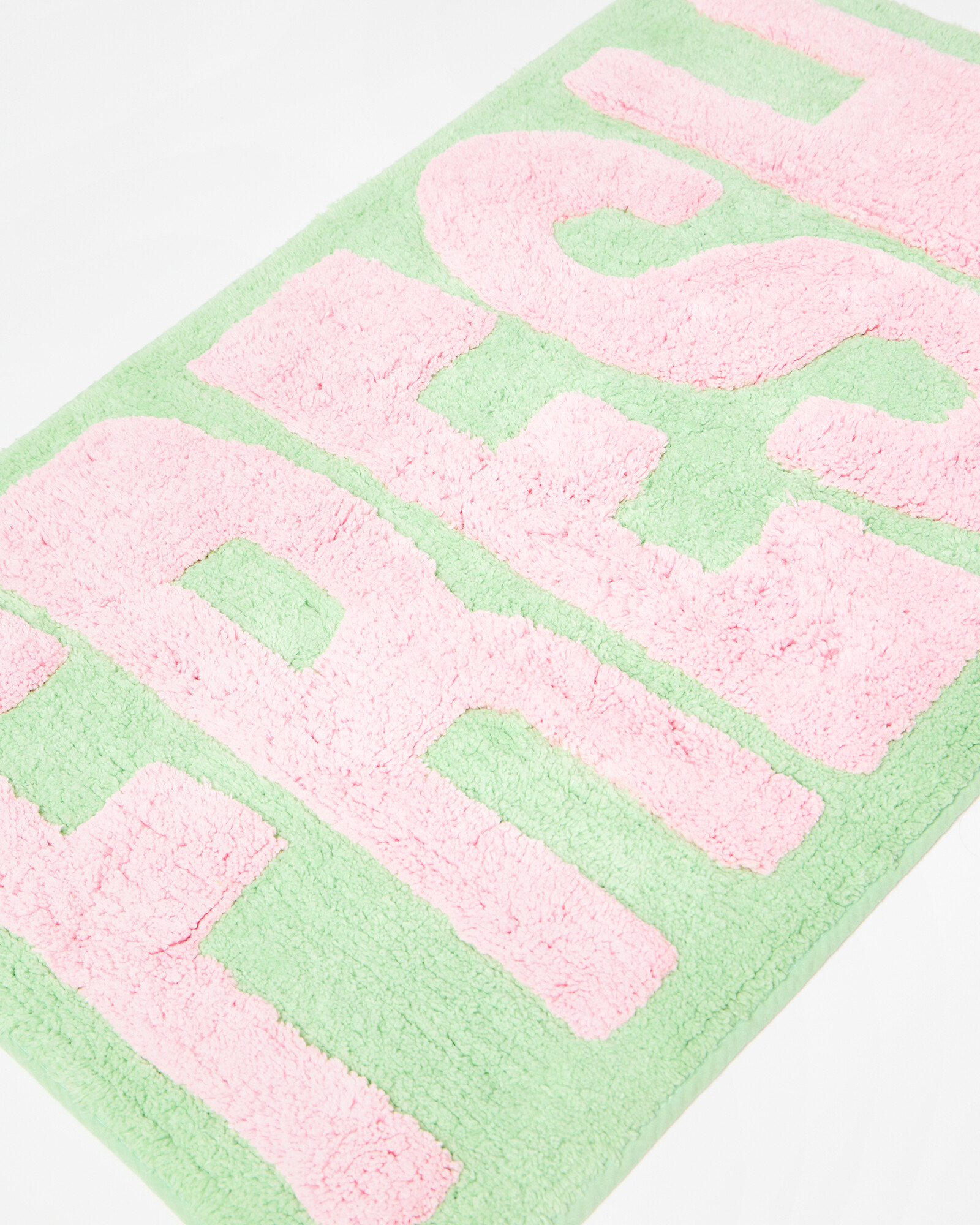 Fresh Green & Pink Slogan Bath Mat | Oliver Bonas