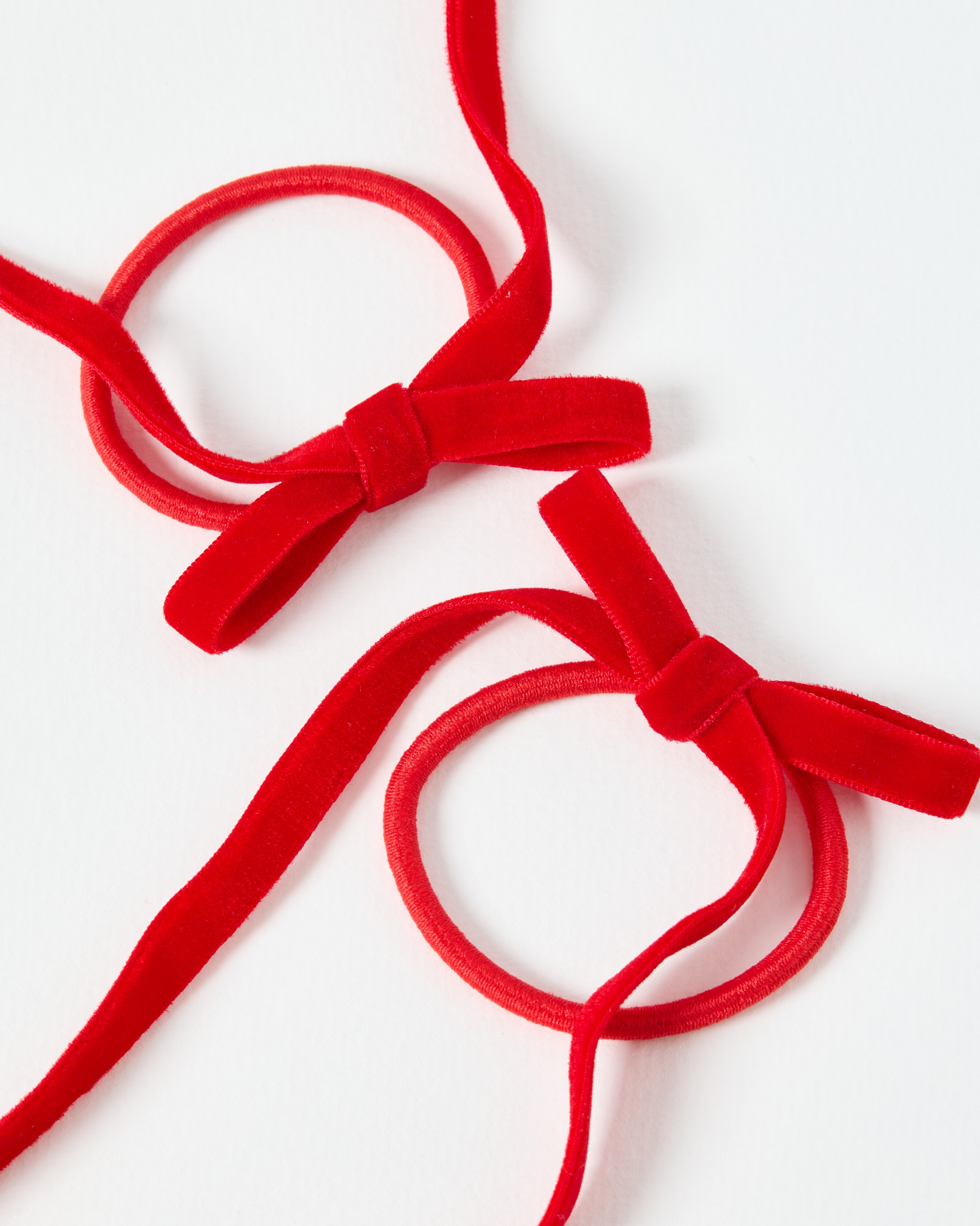 Velma Red Velvet Bow Hair Bands Set of Two | Oliver Bonas