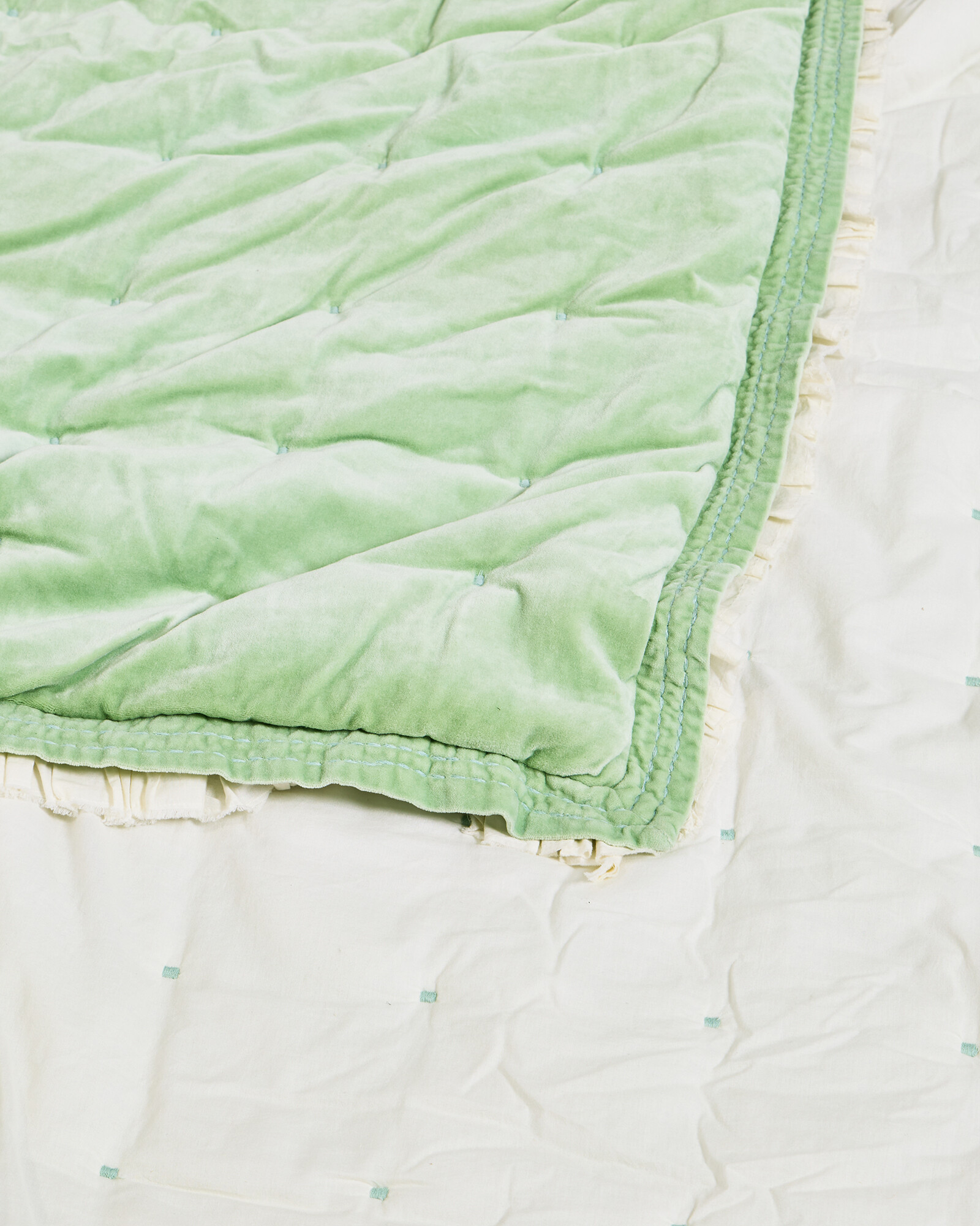Green Ruffle Trim Velvet Quilt | Oliver Bonas