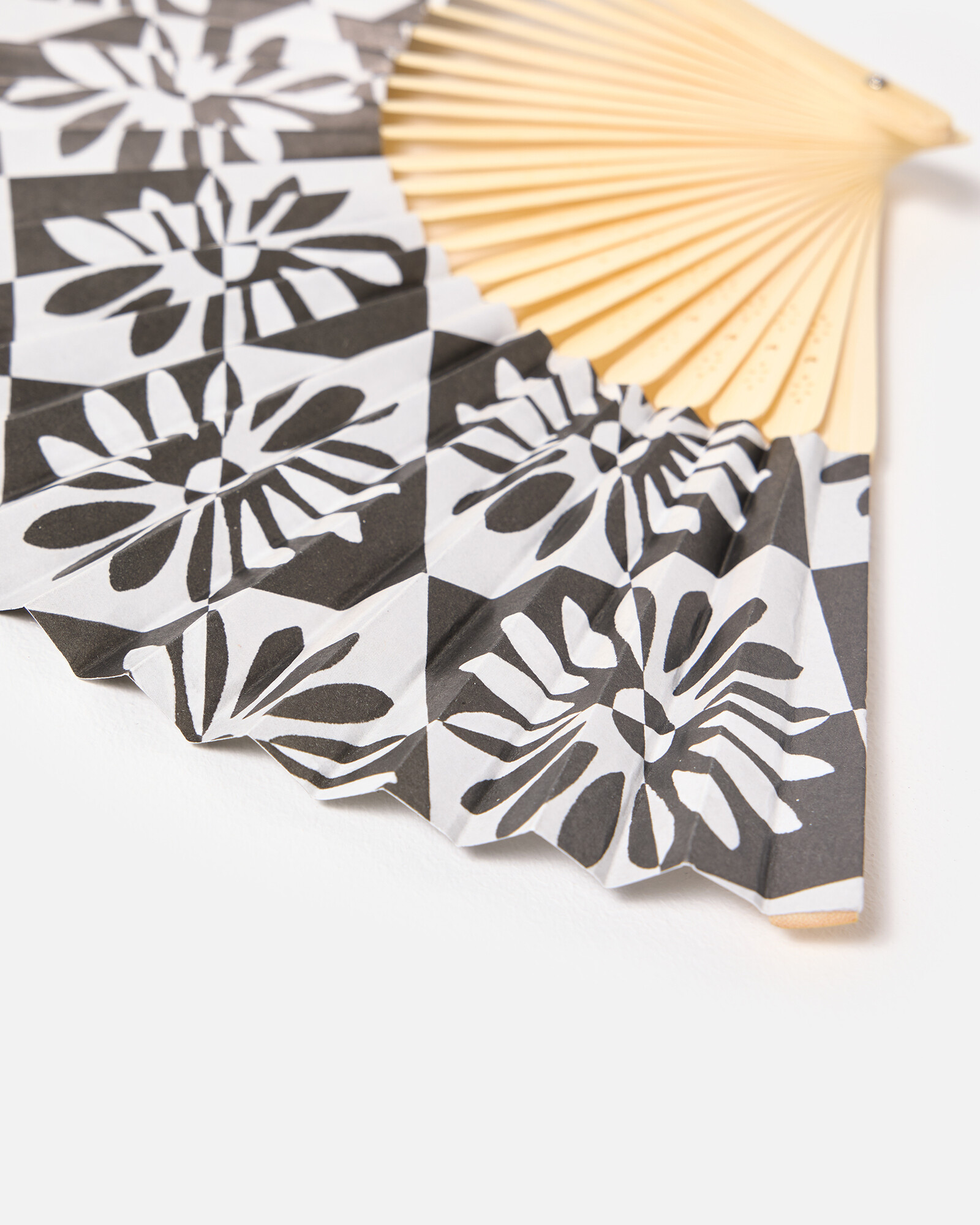 Monochrome Daisy Printed Hand Held Fan | Oliver Bonas