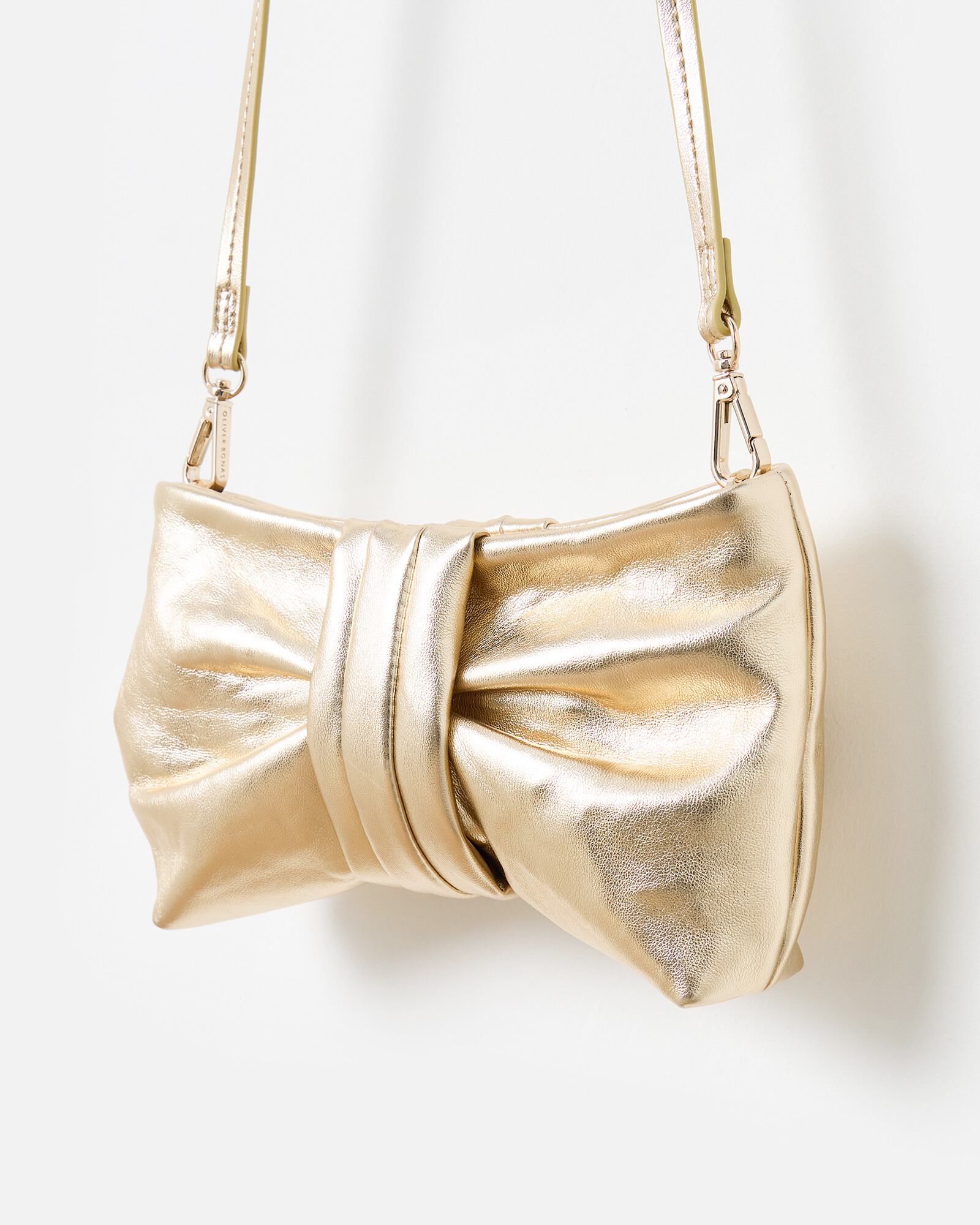Gold Metallic Bow Clutch Bag | Oliver Bonas