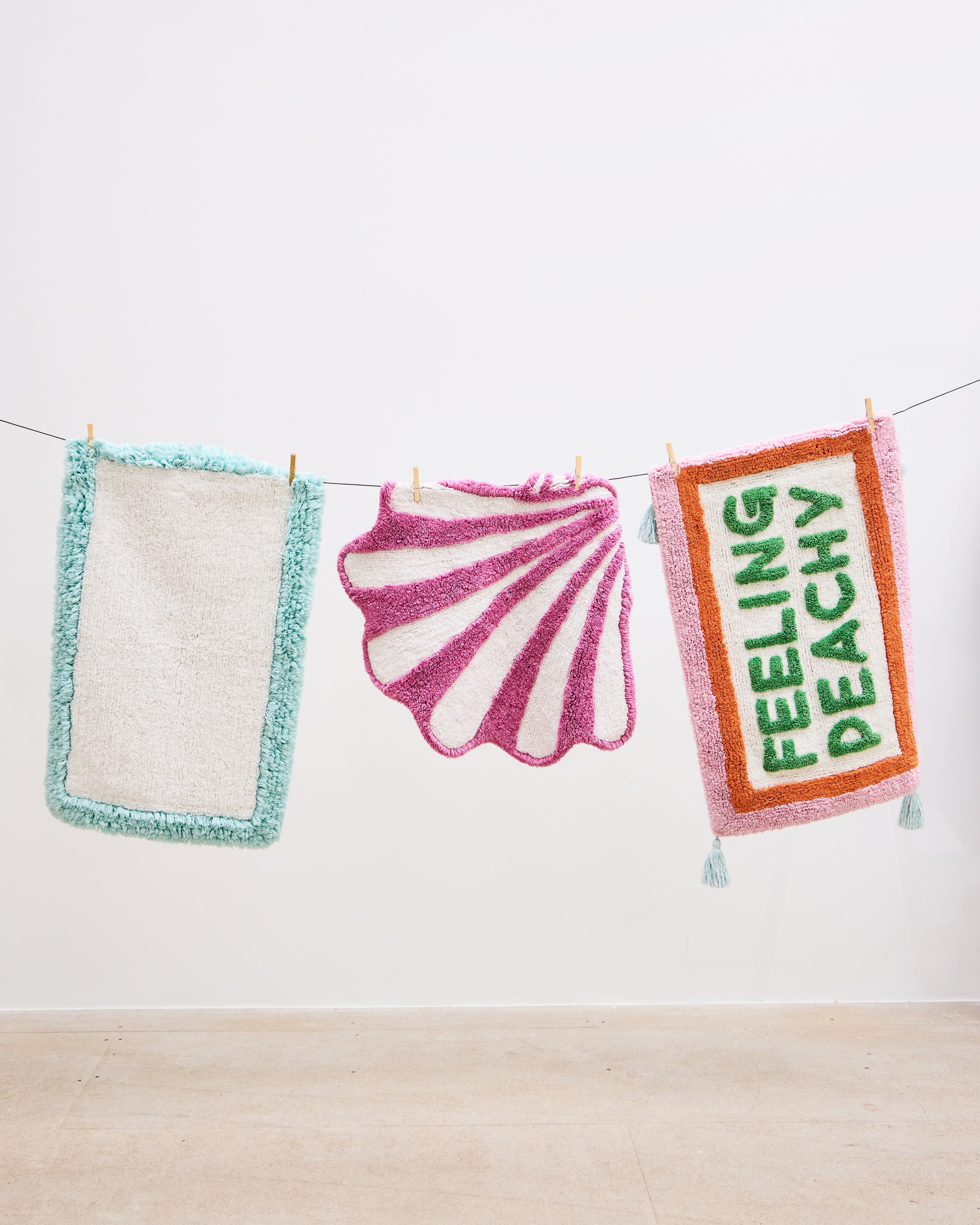 Shell Pink & White Tufted Bathmat | Oliver Bonas